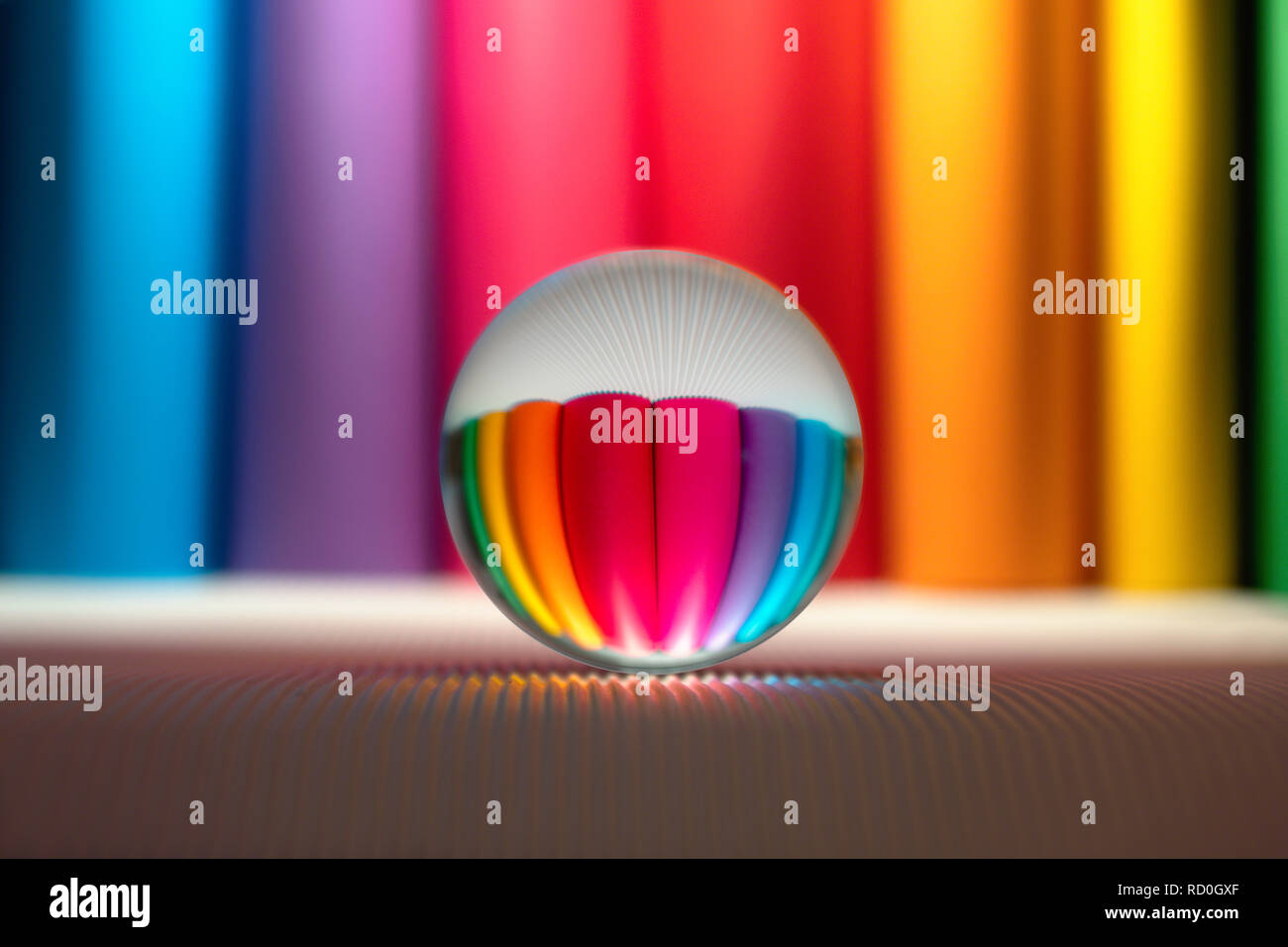 Colors reflected in glass sphere Stock Photo - Alamy