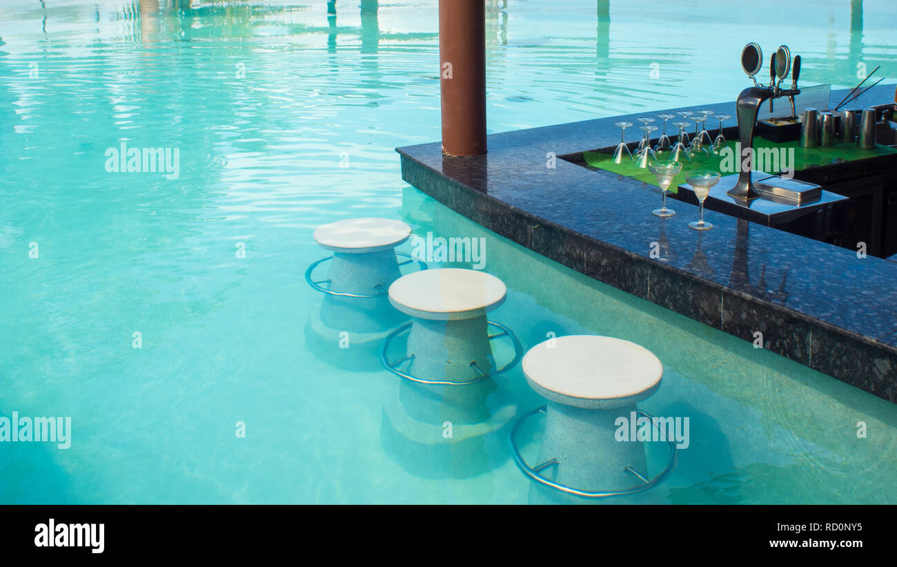 The bar in the pool. Luxury resort on tropical iseland. Hotel terrace ...