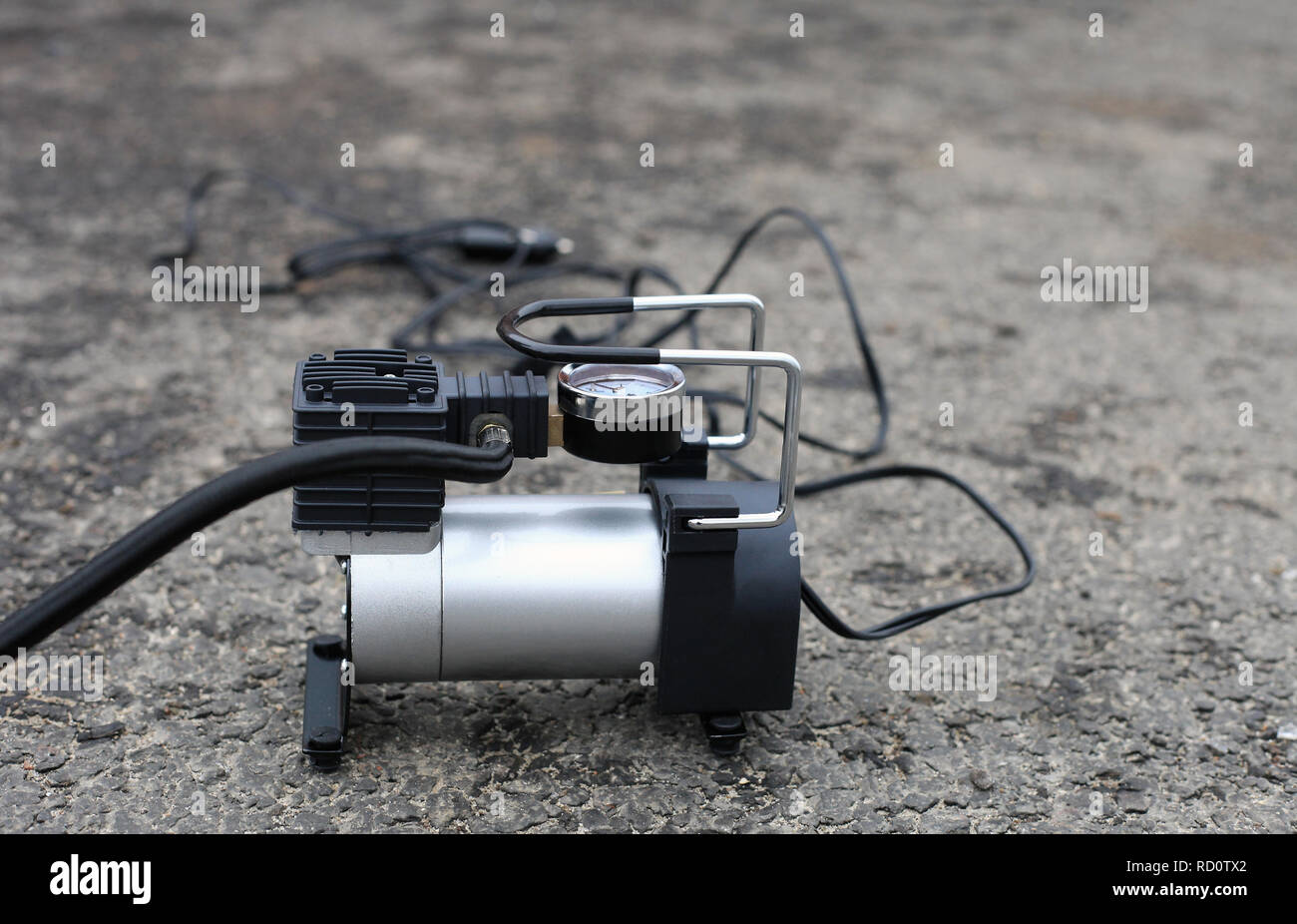 Tire filling device hi-res stock photography and images - Alamy