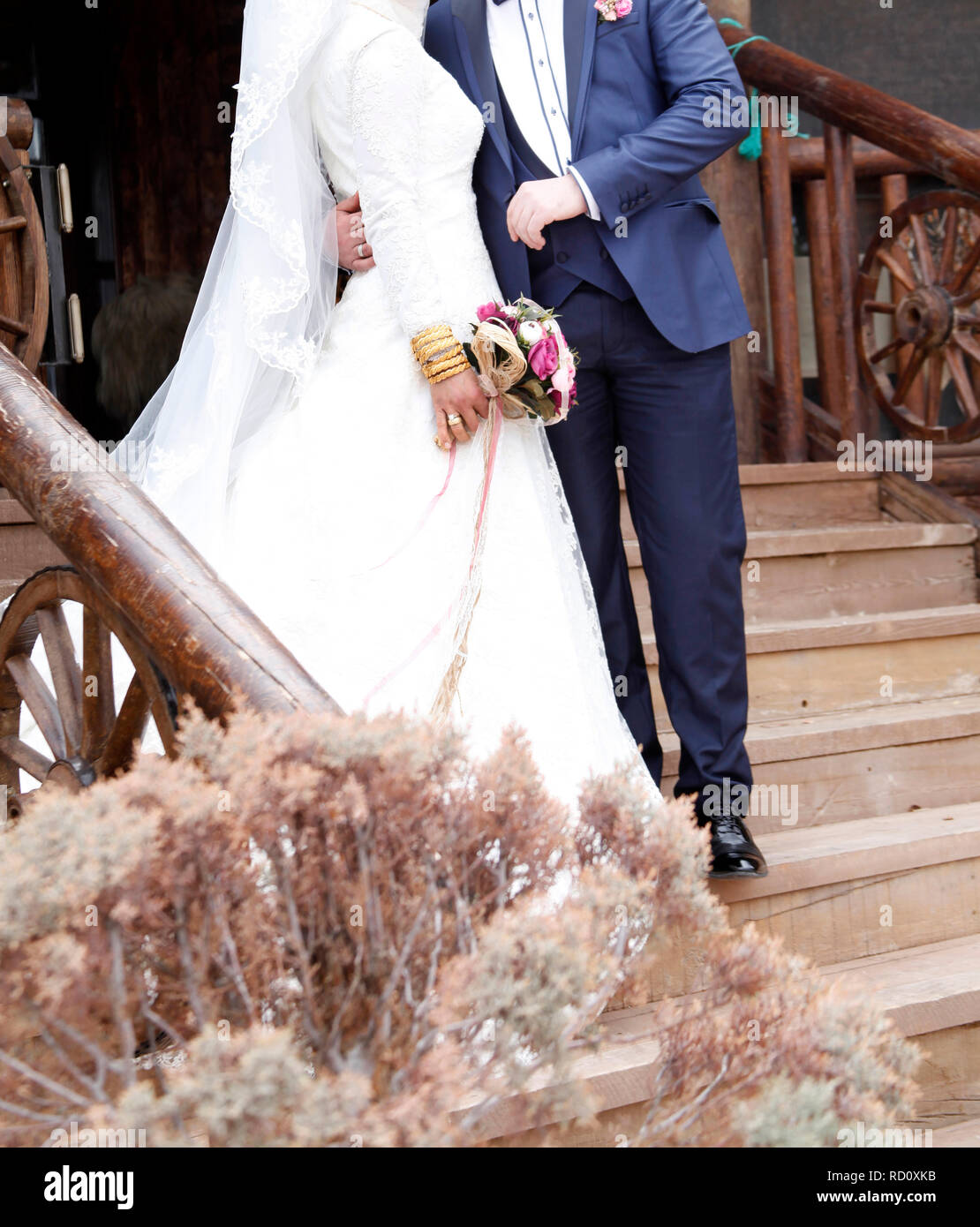 Standing groom kissing hand hi-res stock photography and images - Alamy