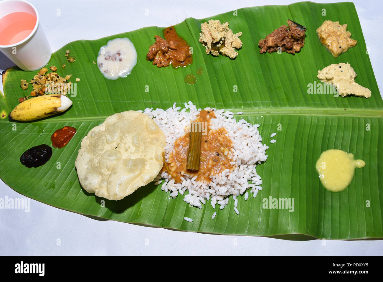 Traditional Onam Sadhya boiled rice served with curries, dessert ...