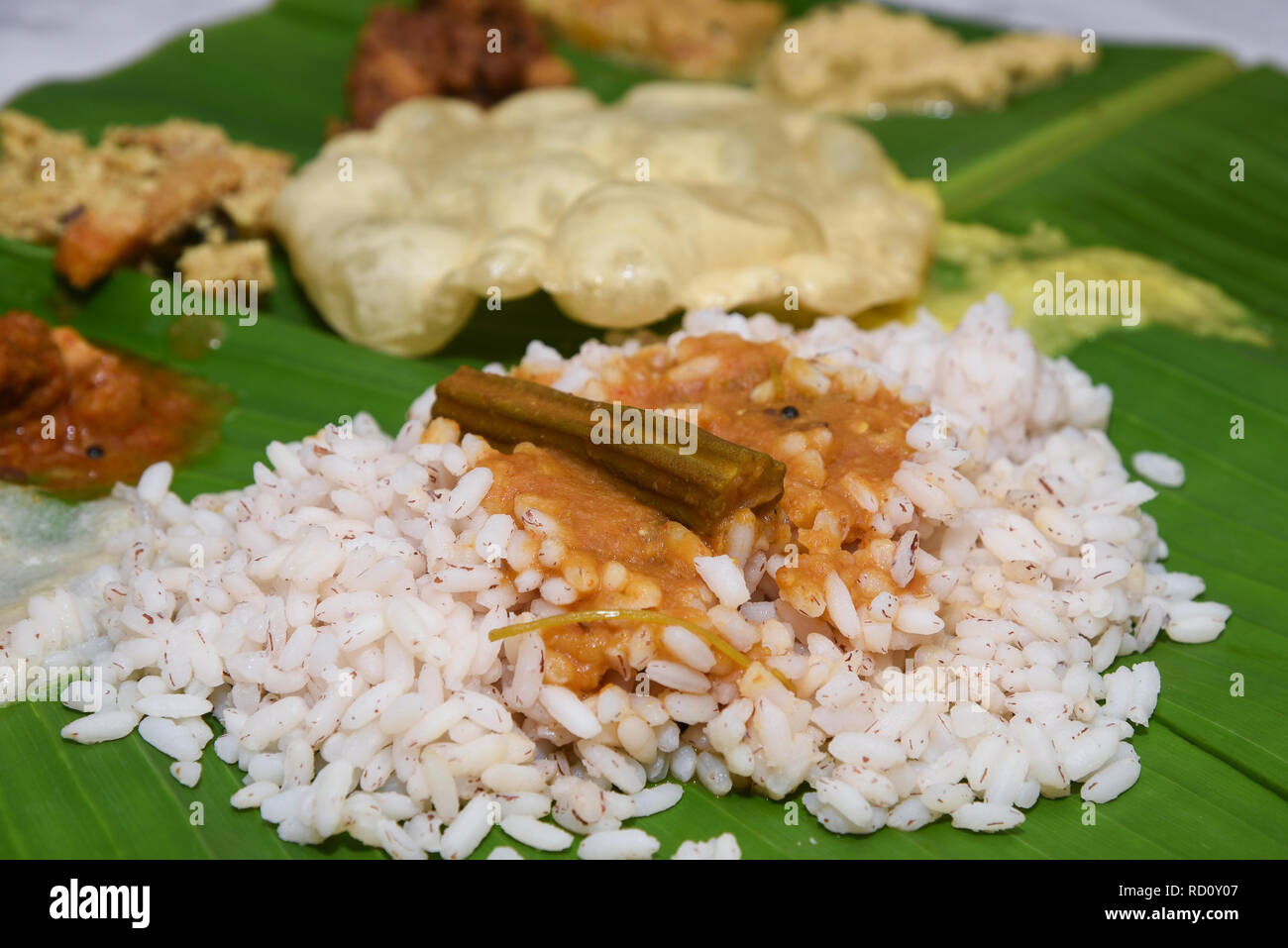 Traditional Onam Sadhya boiled rice served with curries, dessert ...