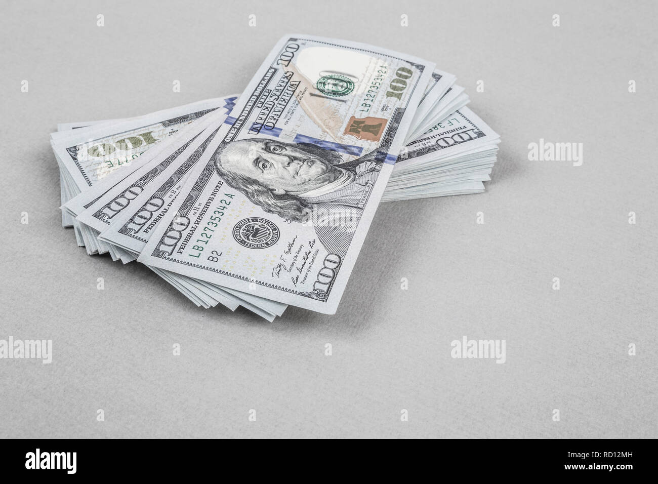 Stacks 100 dollar banknotes hi-res stock photography and images - Alamy
