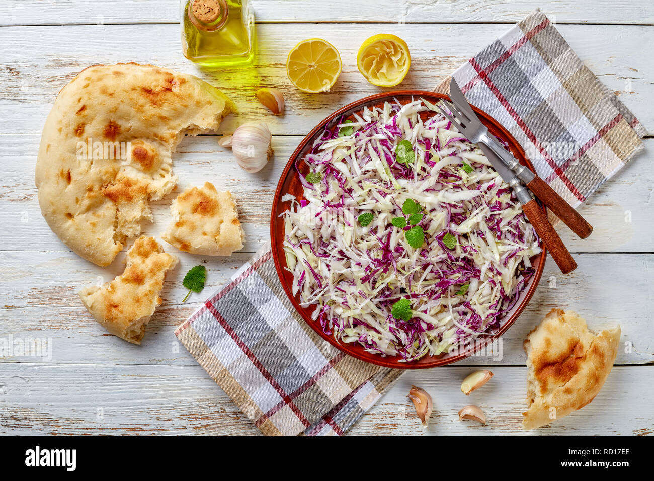 overhead view of Lebanese Cabbage salad with lemon juice, olive oil ...