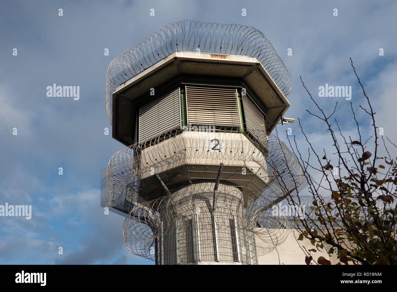 Watchtower of a correctional facility of a prison with a balustrade and ...