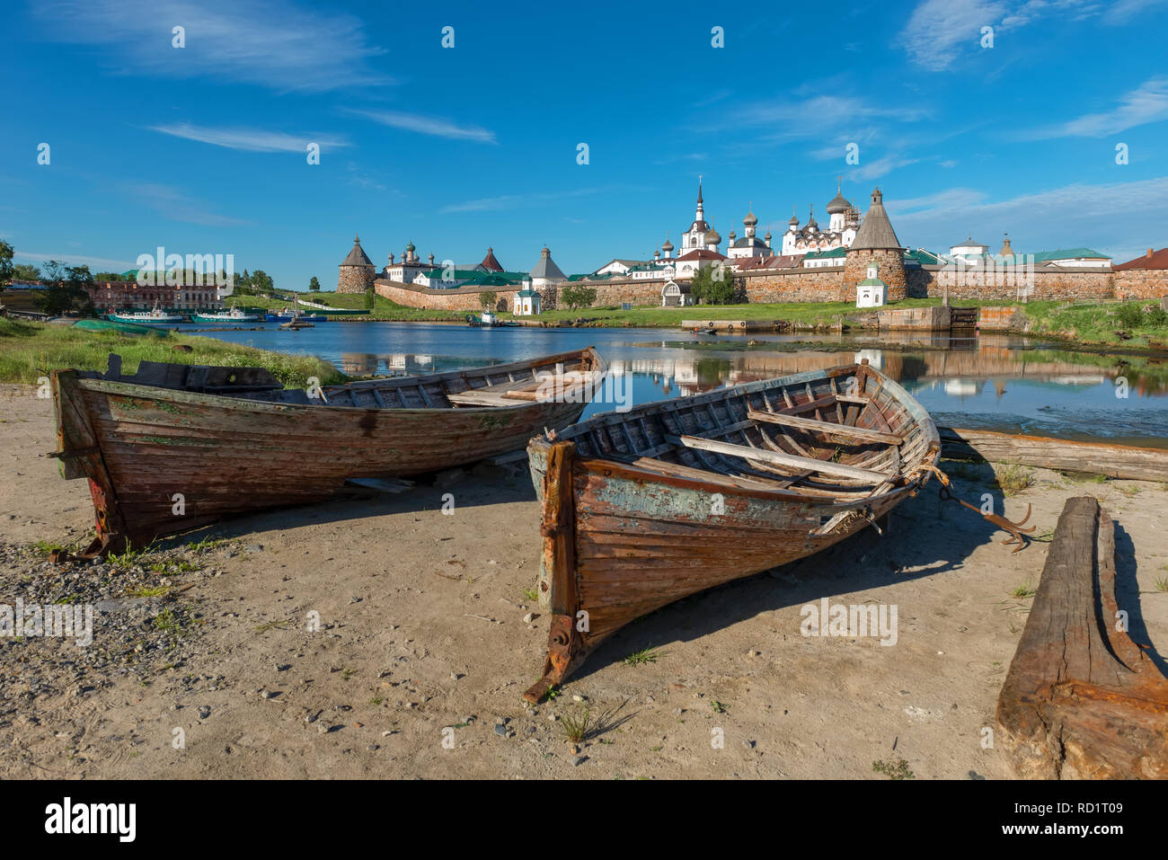 Old fishing boats on the shore against the background of the ...