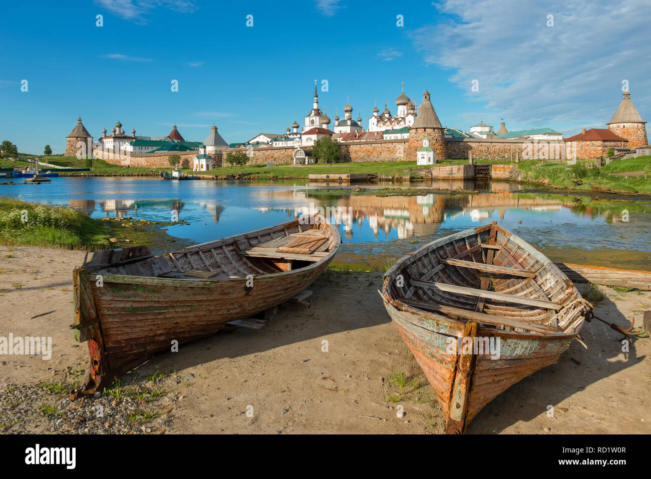 Old fishing boats on the shore against the background of the ...