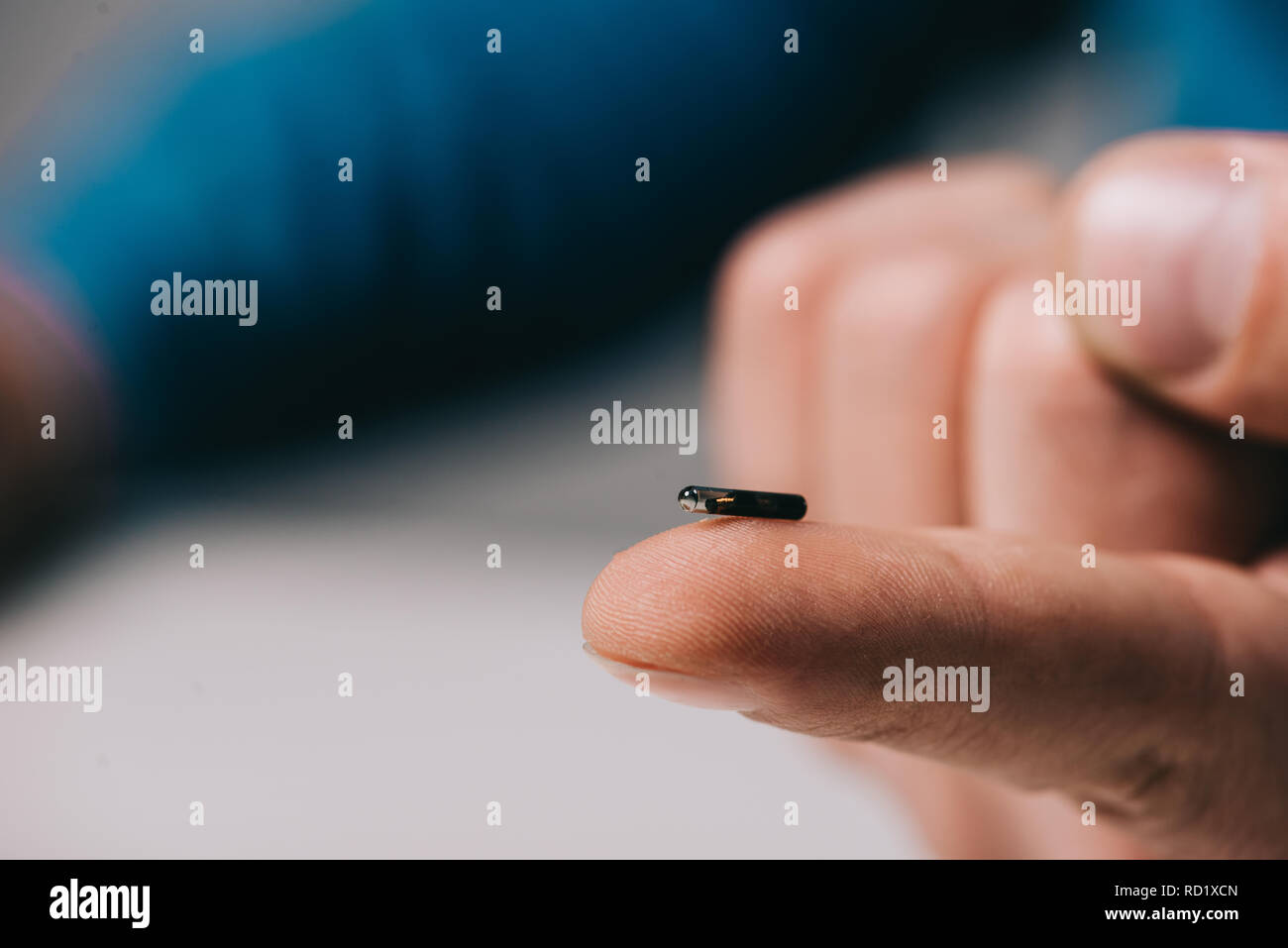 Microchip finger hi-res stock photography and images - Alamy