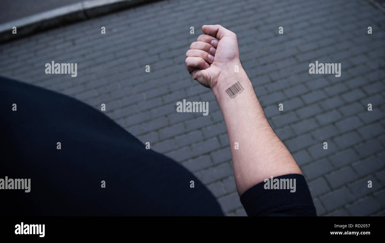 cropped view of barcode on male hand on street Stock Photo - Alamy