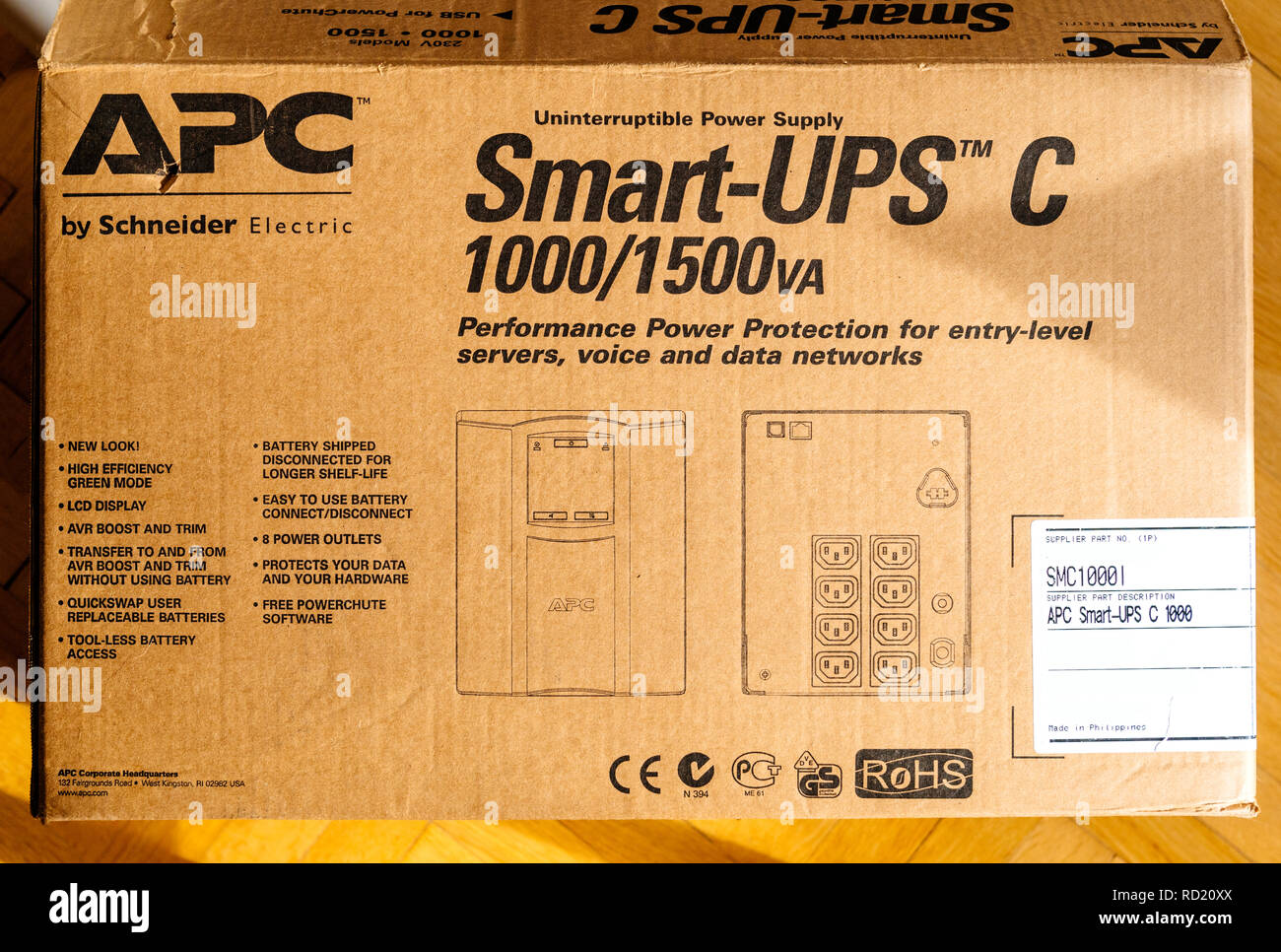 PARIS, FRANCE - MAR 29, 2018: Cardboard unboxing of APC Smart-UPS C ...