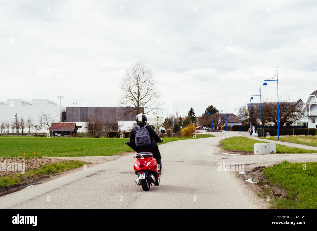 Girl riding vespa hi-res stock photography and images - Alamy