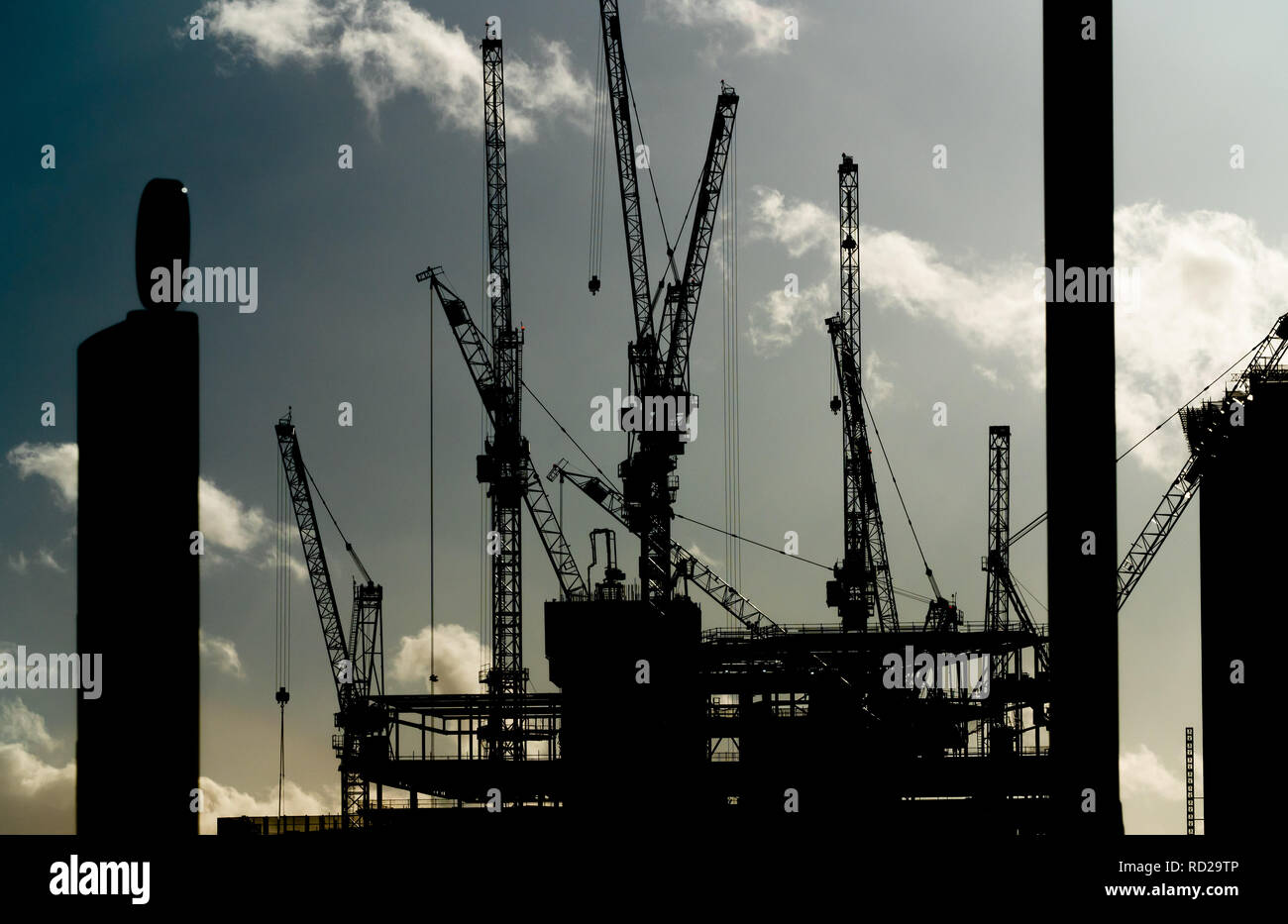 Multiple cranes on a building construction site in high contrast Stock ...