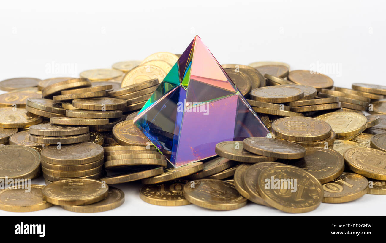 The glass pyramid lies on a pile of ten-ruble Russian coins Stock Photo ...