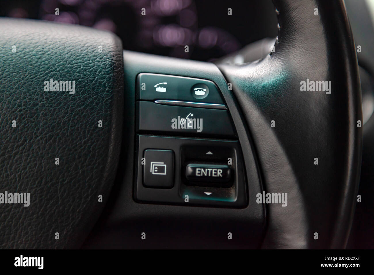 Phone control buttons via bluetooth on the steering wheel of a car ...