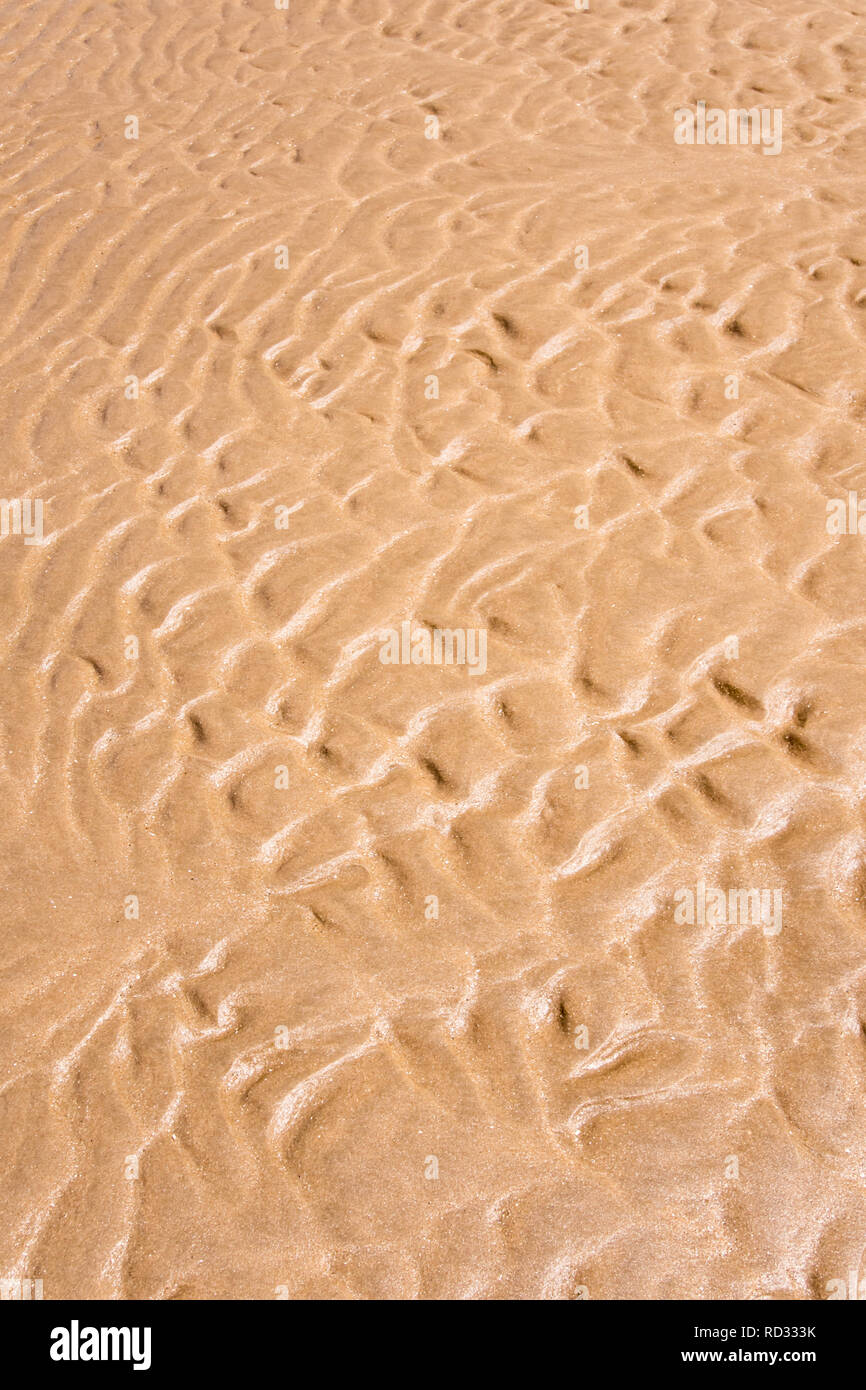 Wave on fine sand when the sea is ebb tide Stock Photo - Alamy