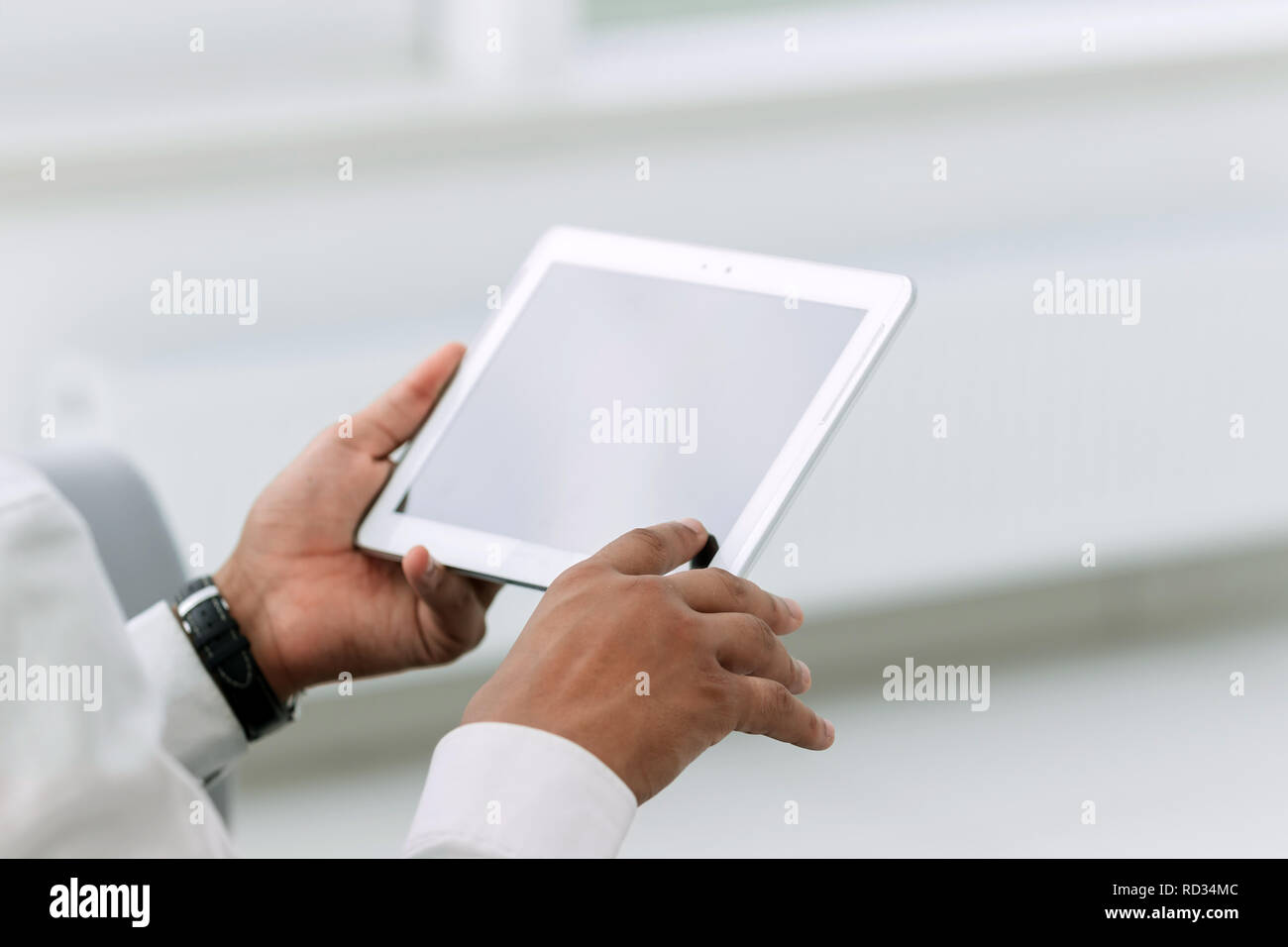 close up. businessman tapping the screen of the digital tablet Stock ...