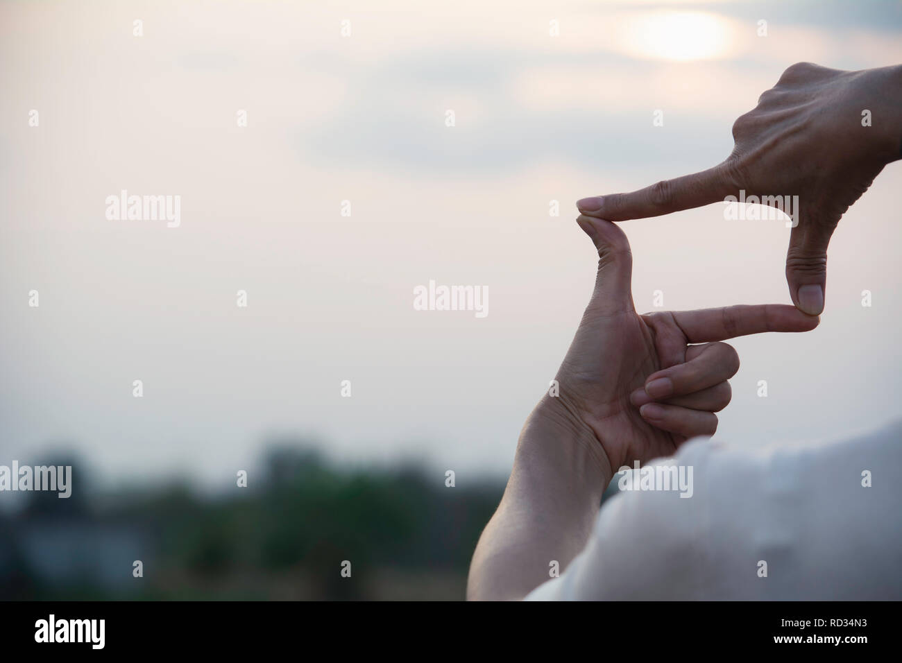 Woman making rectangle fingers hi-res stock photography and images - Alamy