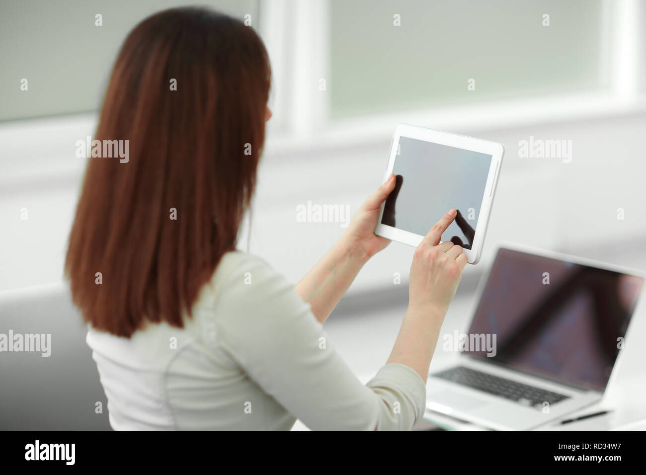 business woman with digital tablet in the workplace Stock Photo - Alamy
