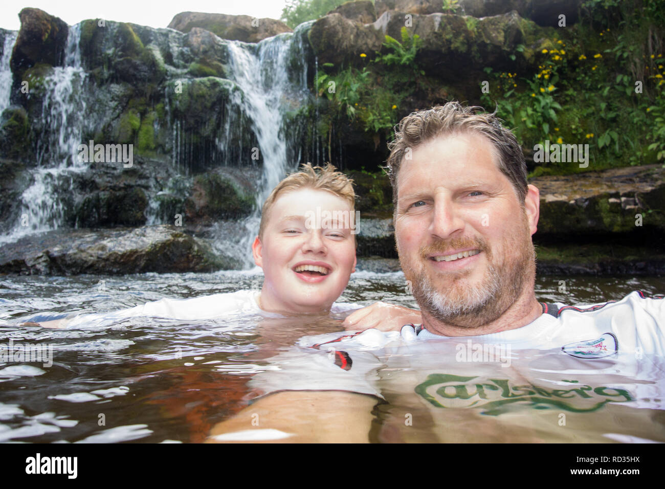 Child playing in a river england hi-res stock photography and images ...