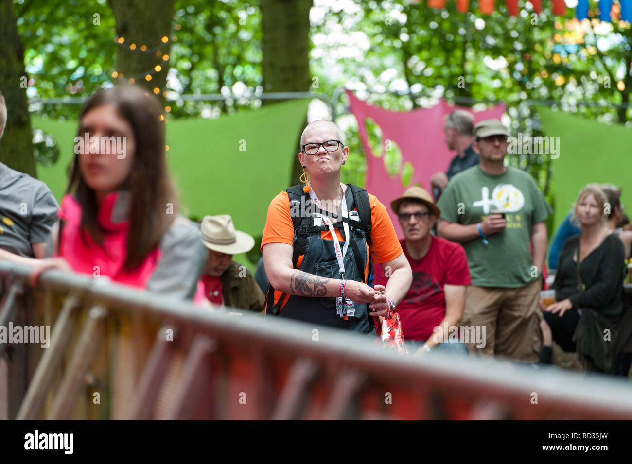Photographer taking a break at a music festival Stock Photo - Alamy