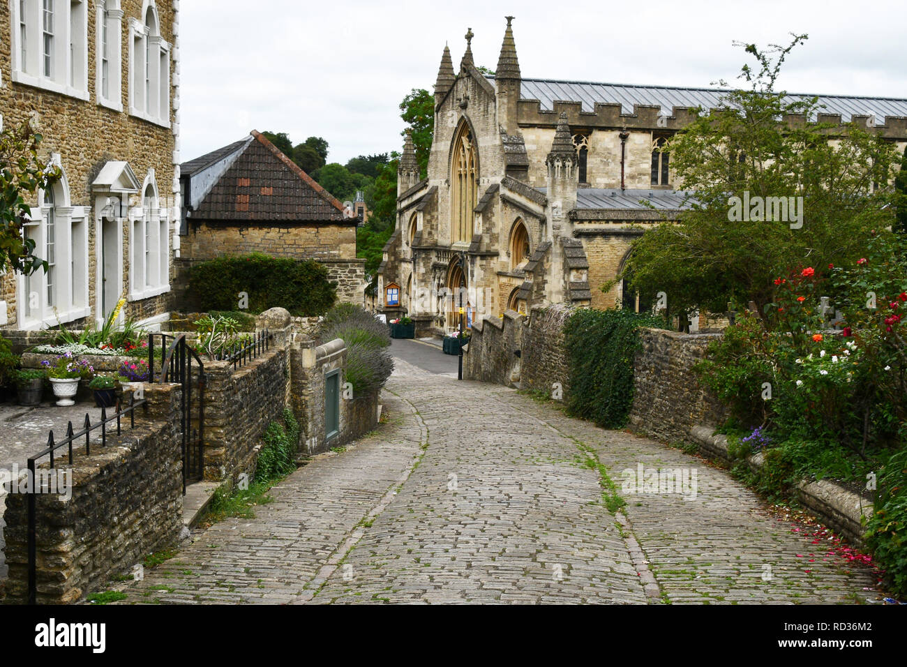 Gentle Street in Frome, Somerset descends to St Johns Church.This steep ...