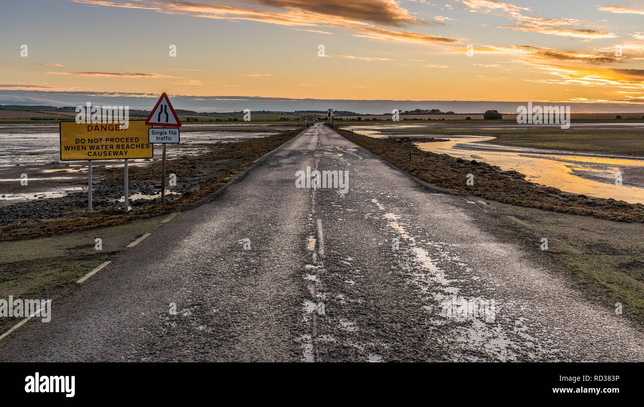 Sign: Single File Traffic, Danger do not proceed when water reaches ...