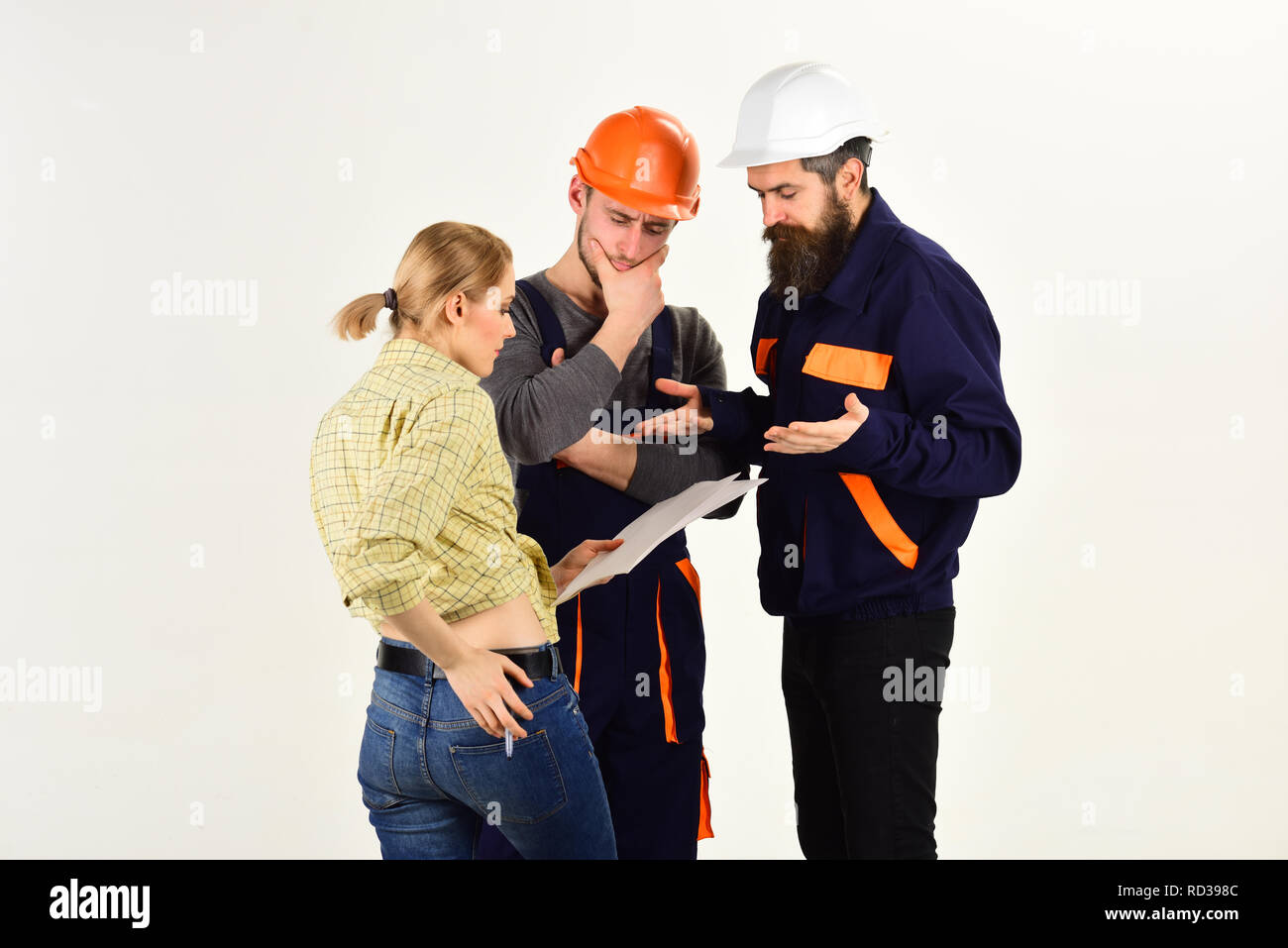 Concentrated on their project. People designers working on construction ...