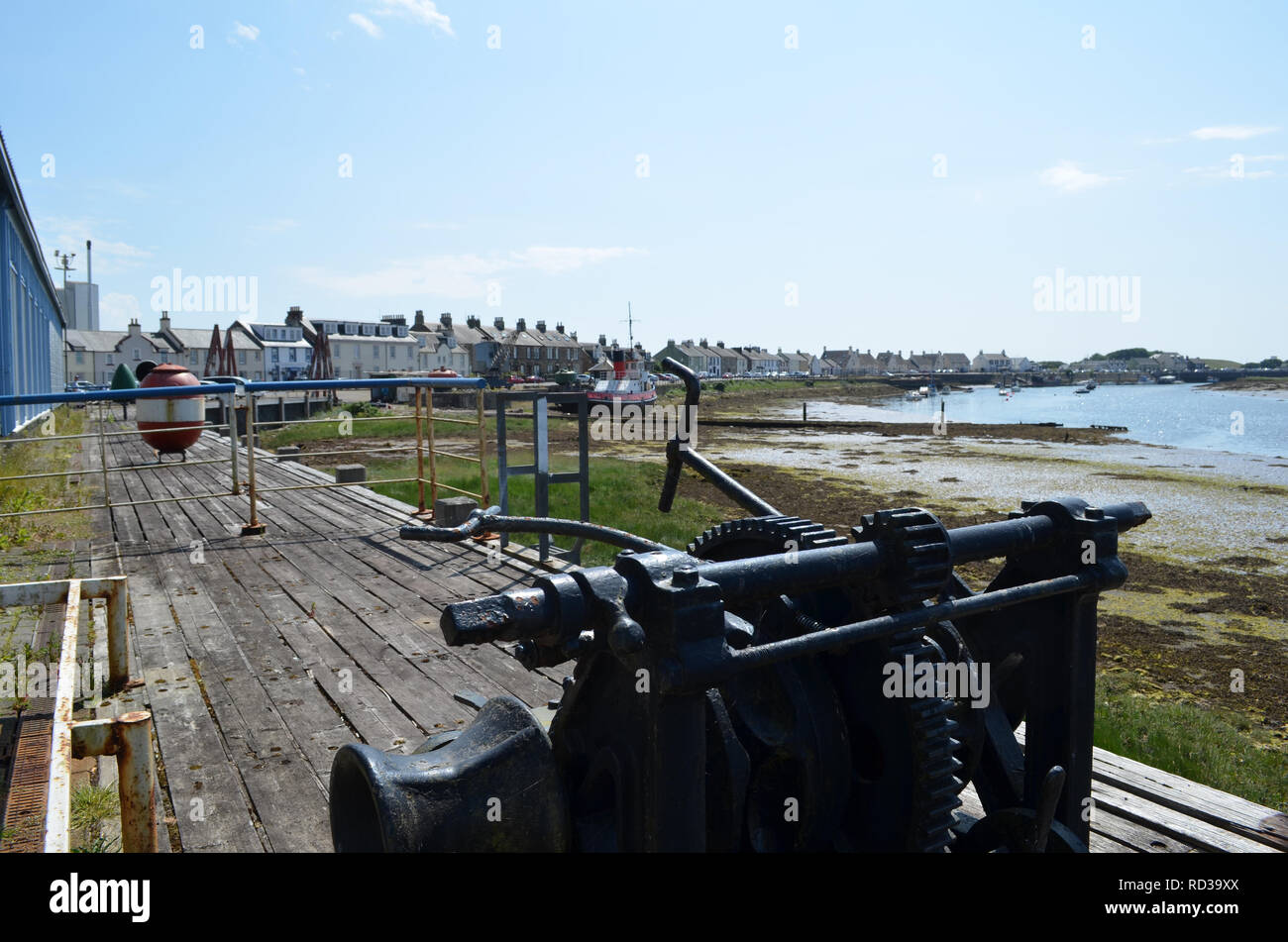 old rusty disused winch on the harbour at Irvine Stock Photo - Alamy