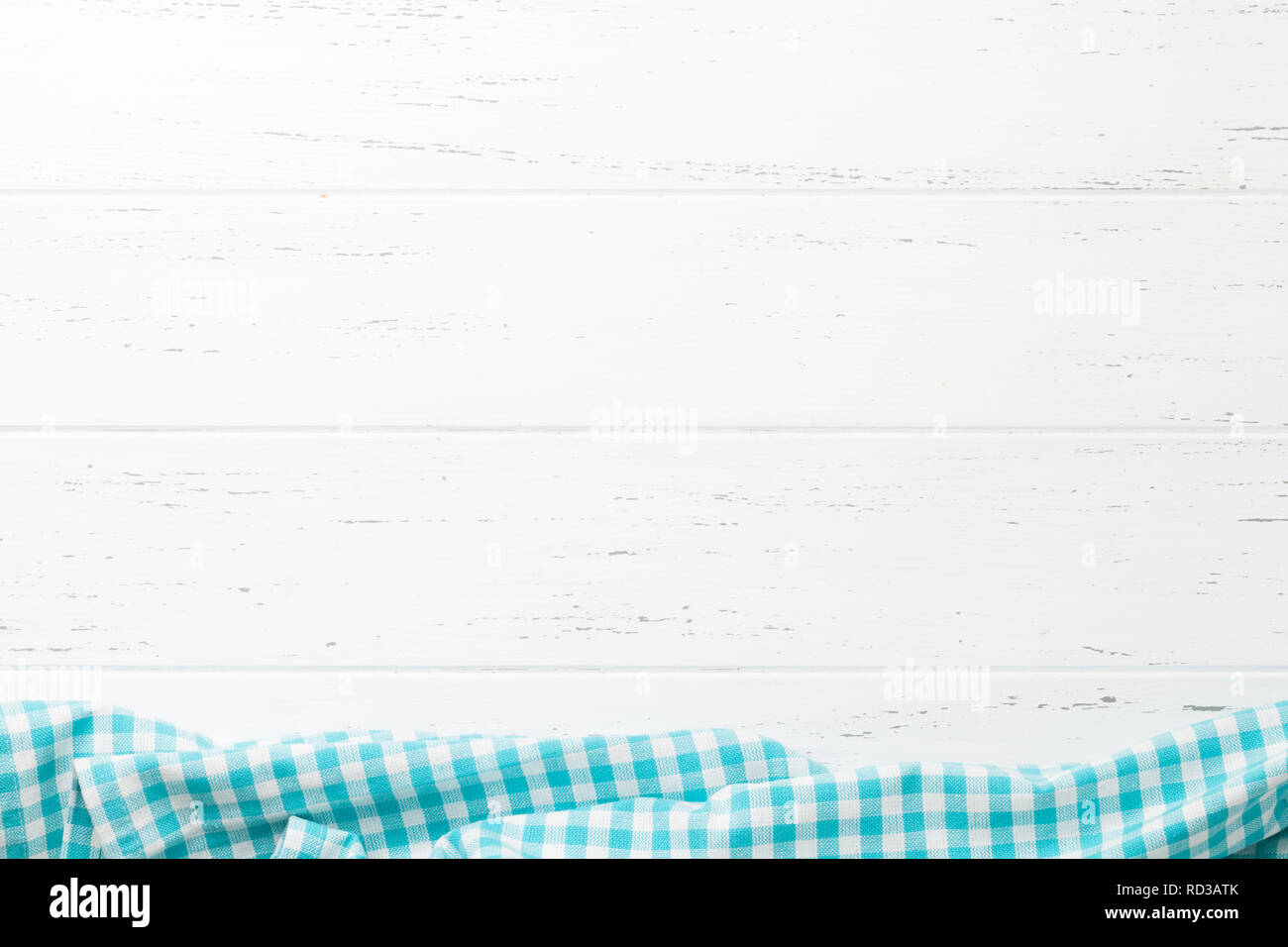 Cooking wooden table with kitchen towel or napkin. Top view with space ...