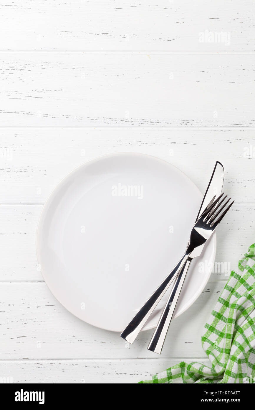 Dinner plate setting with cutlery. Top view with copy space. Flat lay ...