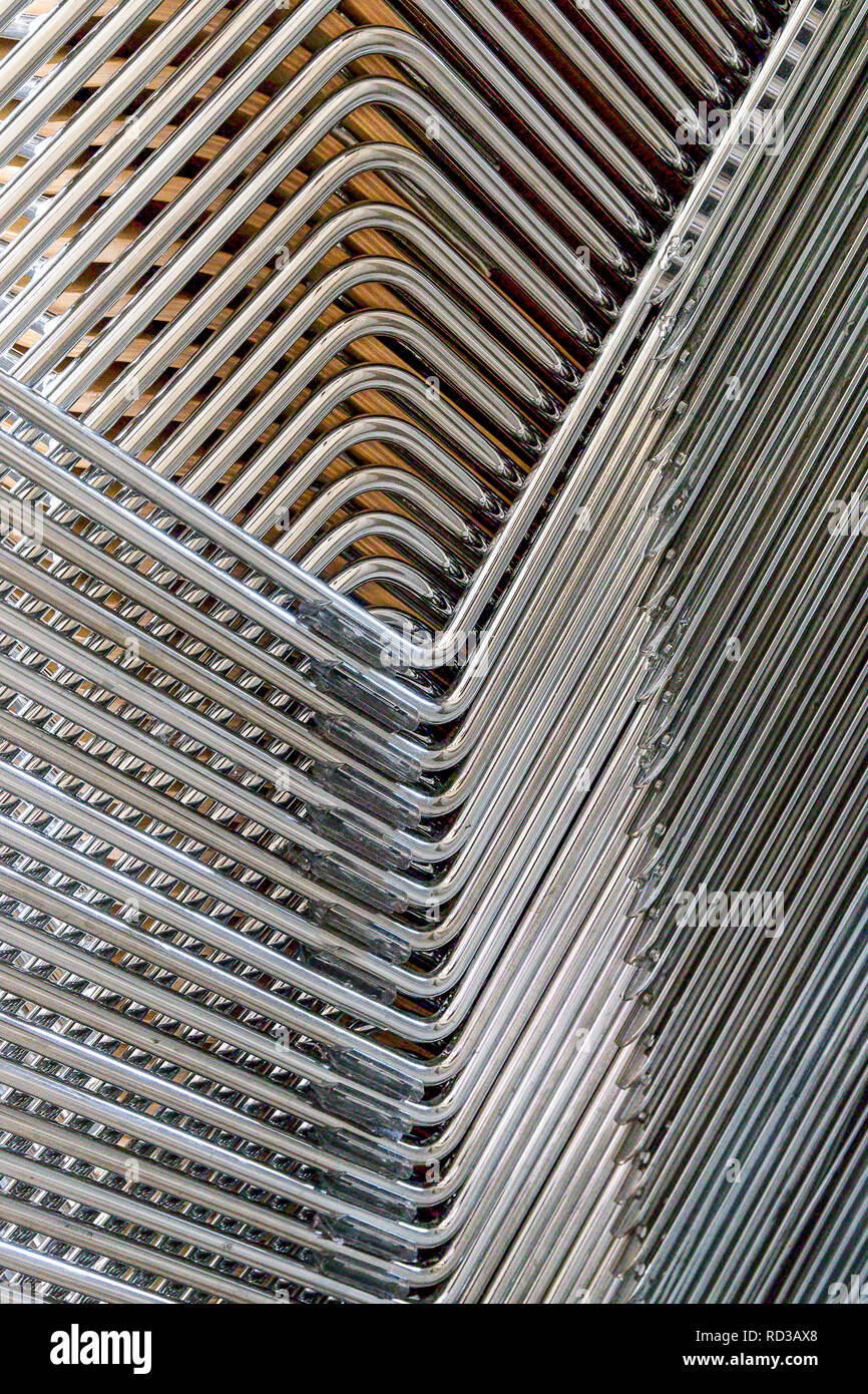Image of chrome stacking chairs hi-res stock photography and images - Alamy