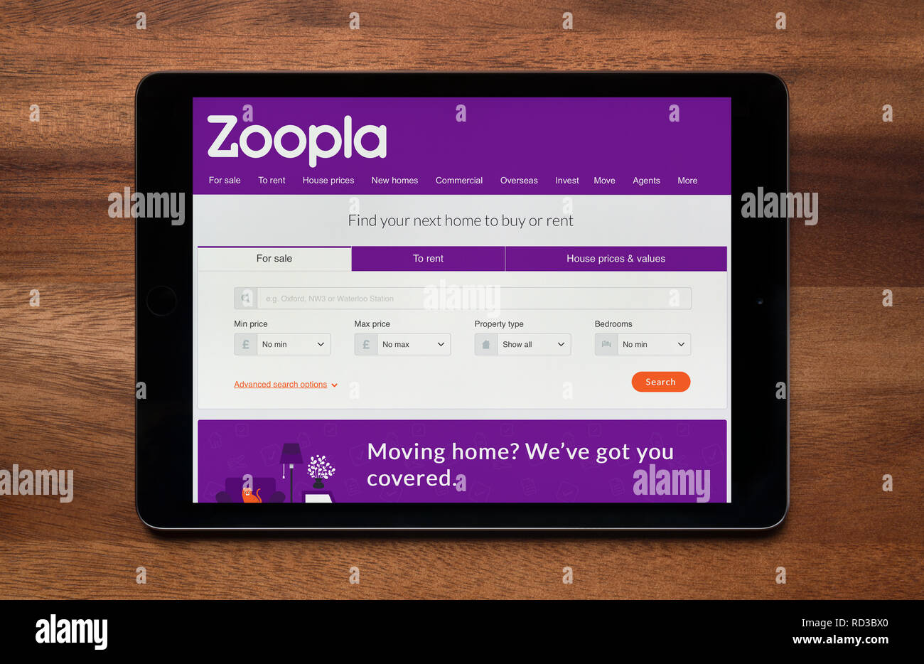 The website of Zoopla is seen on an iPad tablet, which is resting on a ...