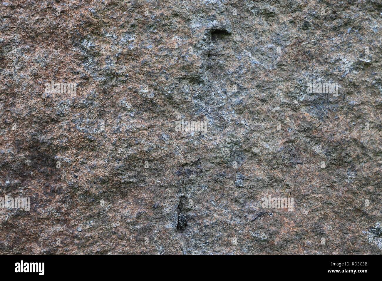 Close up high resolution surface of granite wall structures in ...