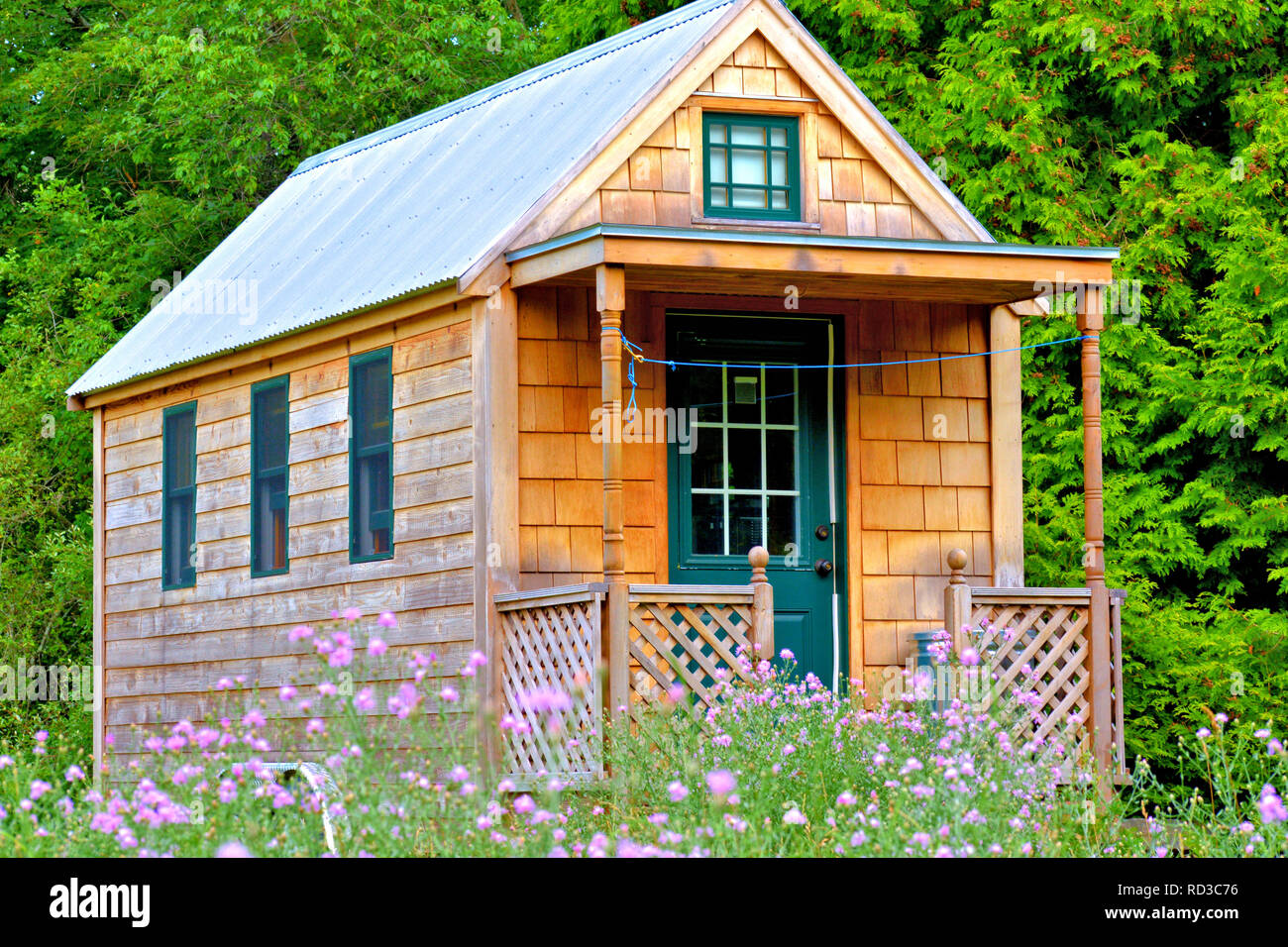 Closeup view of a tiny house with a front porch Stock Photo - Alamy