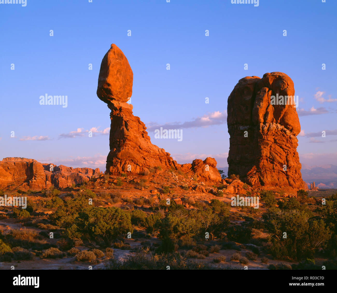 USA, Utah, Arches National Park, Sunset on the Balanced Rock which is ...