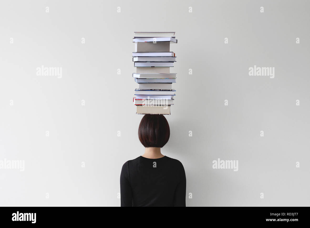 Carrying book rear view hi-res stock photography and images - Alamy