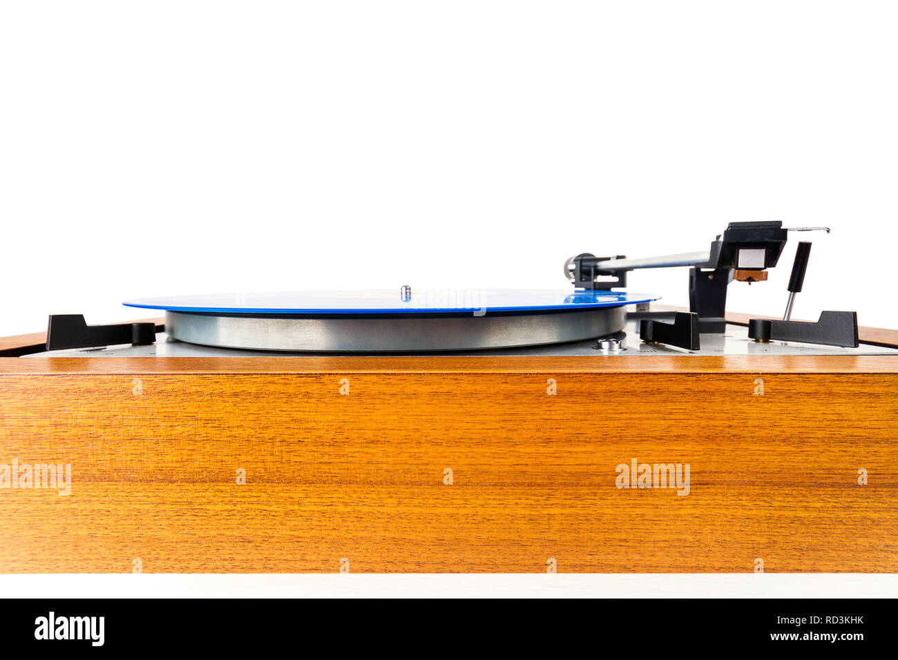 Vintage turntable with a blue vinyl isolated on white. Wooden plinth ...