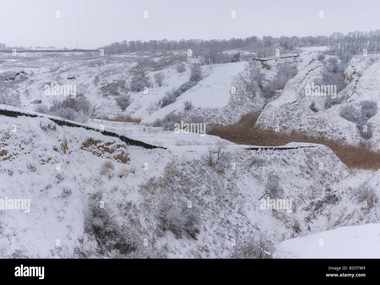 Winter landscape with soil erosion in suburbs of Dnipro city, Ukraine ...