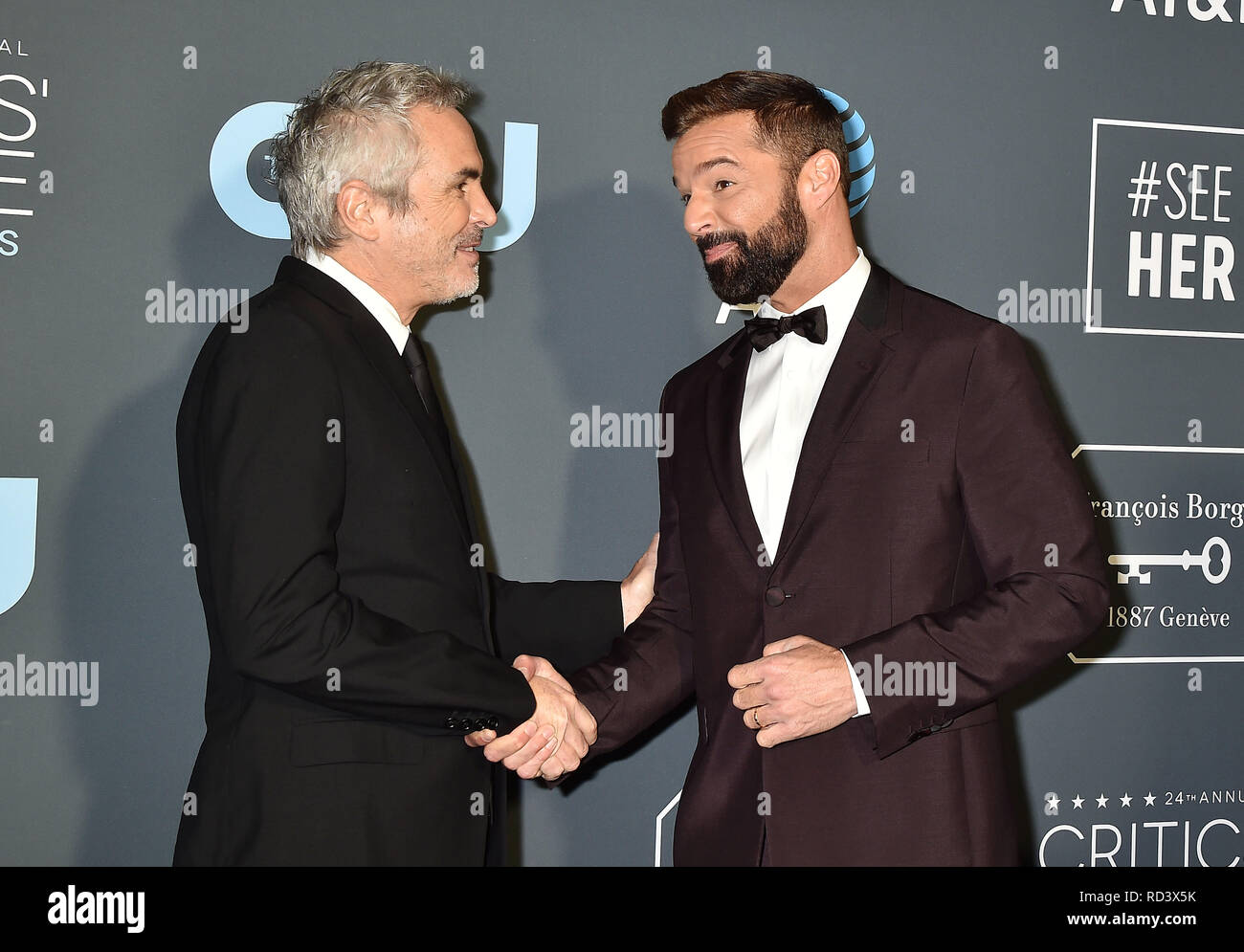 SANTA MONICA, CA - JANUARY 13: Alfonso Cuaron (L) and Ricky Martin ...