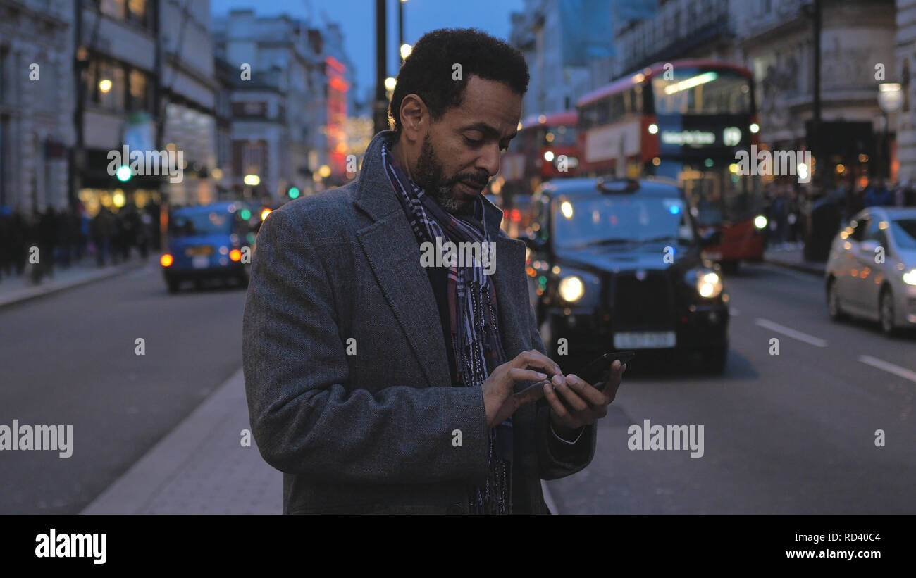 African guy in London on a sightseeing trip Stock Photo - Alamy