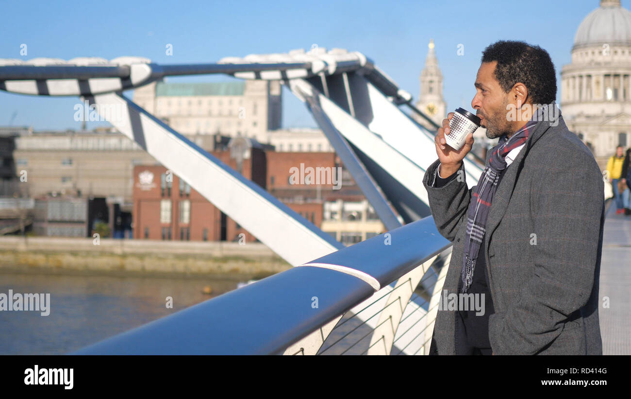 African man on tower bridge hi-res stock photography and images - Alamy