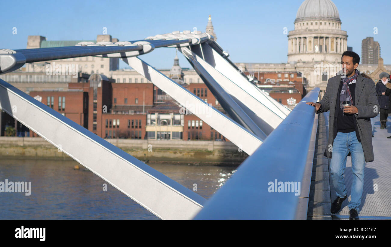 African man on tower bridge hi-res stock photography and images - Alamy