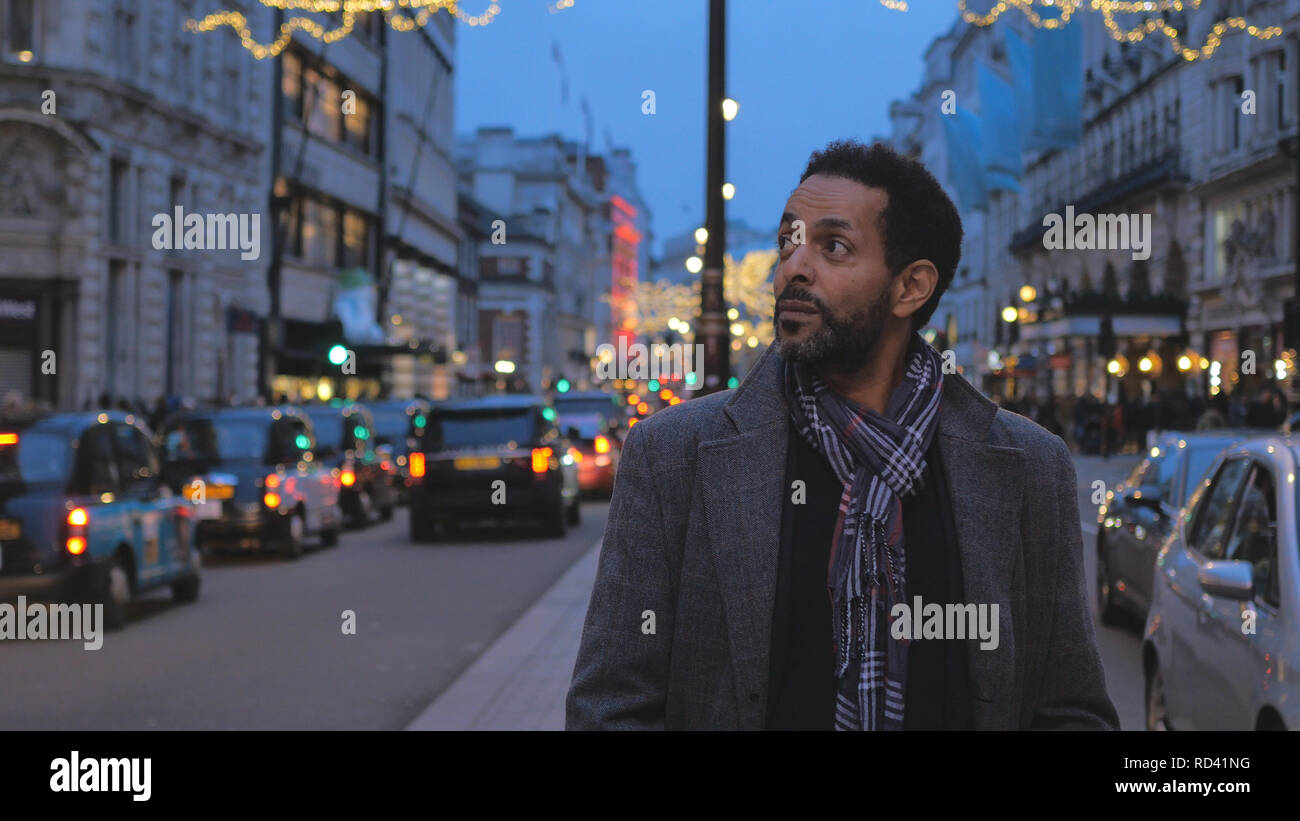 African guy in London on a sightseeing trip Stock Photo - Alamy