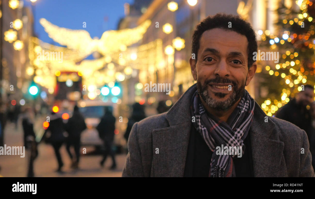 Man in London at Christmas Time Stock Photo - Alamy