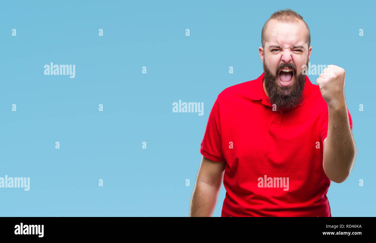 Young caucasian hipster man wearing red shirt over isolated background ...