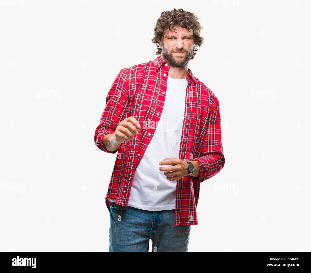 Handsome hispanic model man over isolated background disgusted ...