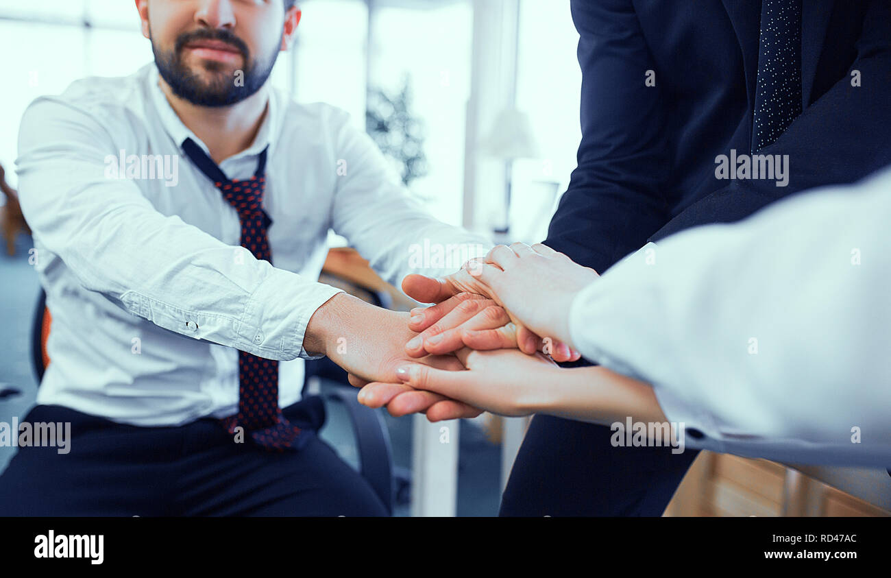 Hands folded together Stock Photo - Alamy