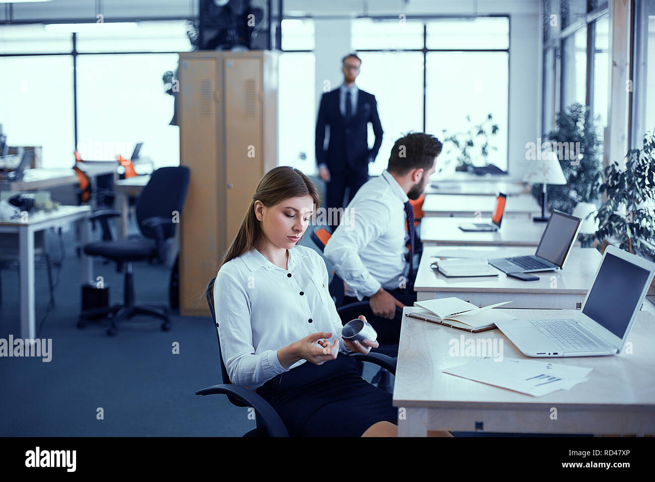 Idle employee in team hi-res stock photography and images - Alamy