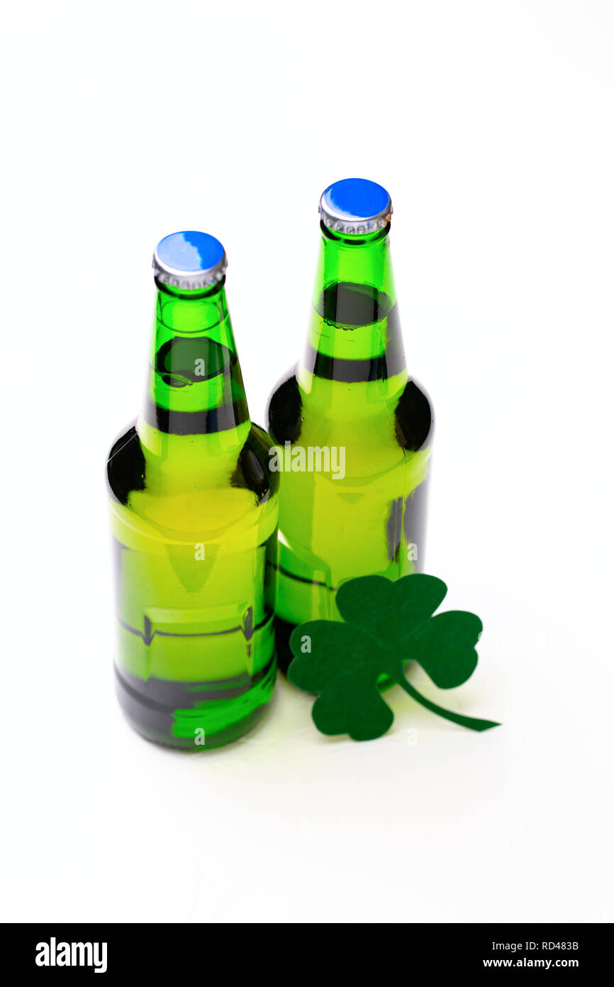 Two buttle of green beer on white background Stock Photo - Alamy