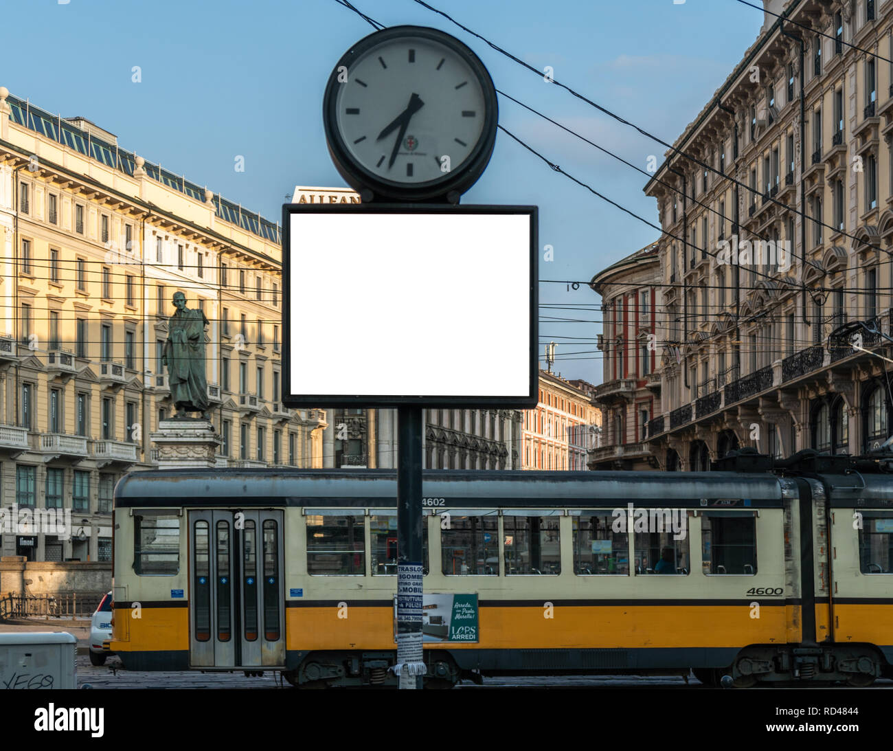 blank billboard clock time mock up in milano city center Stock Photo ...